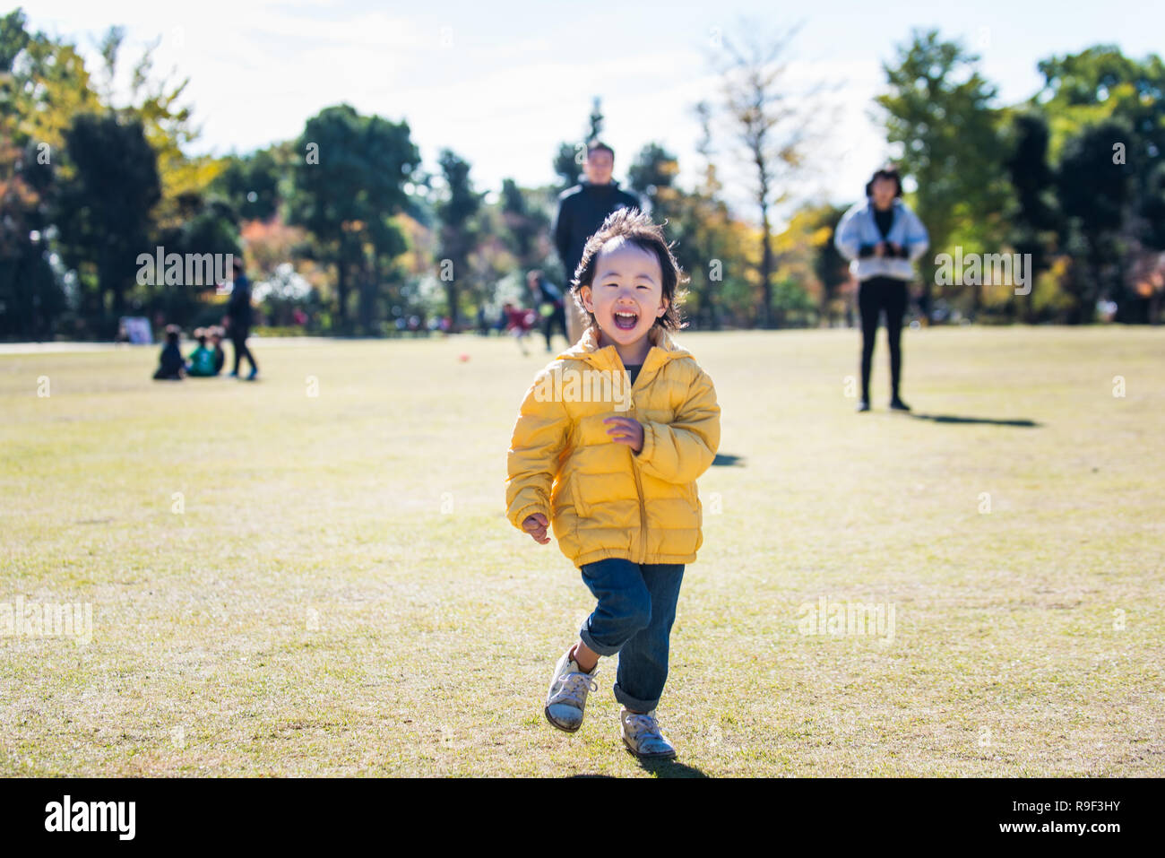 Happy and playful japanese family in a park in Tokyo Stock Photo - Alamy