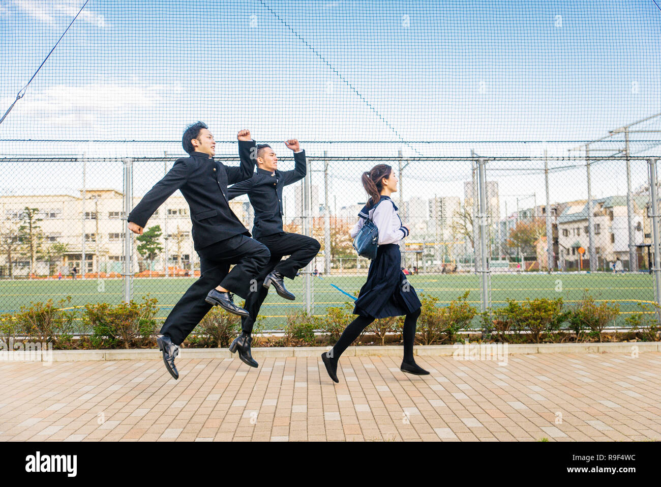 Yung japanese students with school uniform bonding outdoors - Group of ...