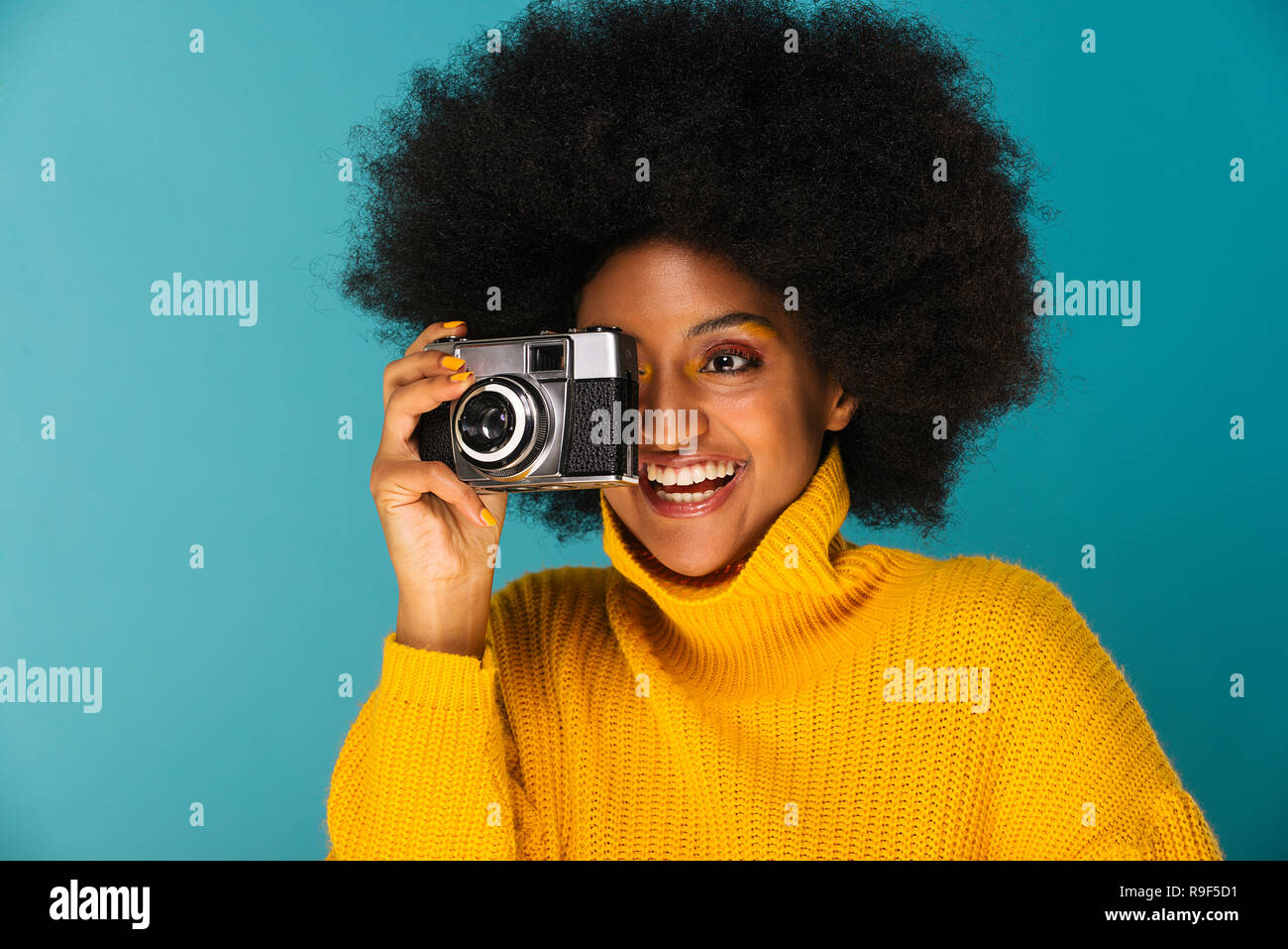 Portrait of pretty afro american woman in a studio for a beauty session ...