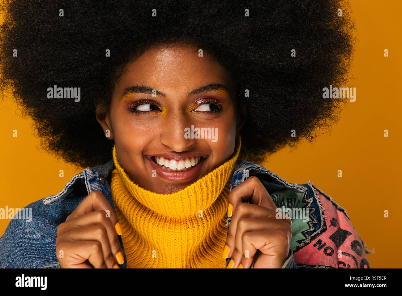 Portrait of pretty afro american woman in a studio for a beauty session ...