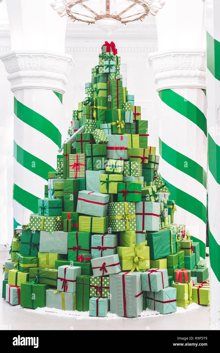 Christmas gift boxes laid out in the shape of a Christmas tree Stock ...