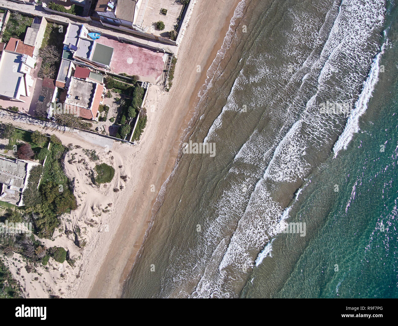 Aerial view of Granelli Beach, a seaside place in Sicily. The shot is ...