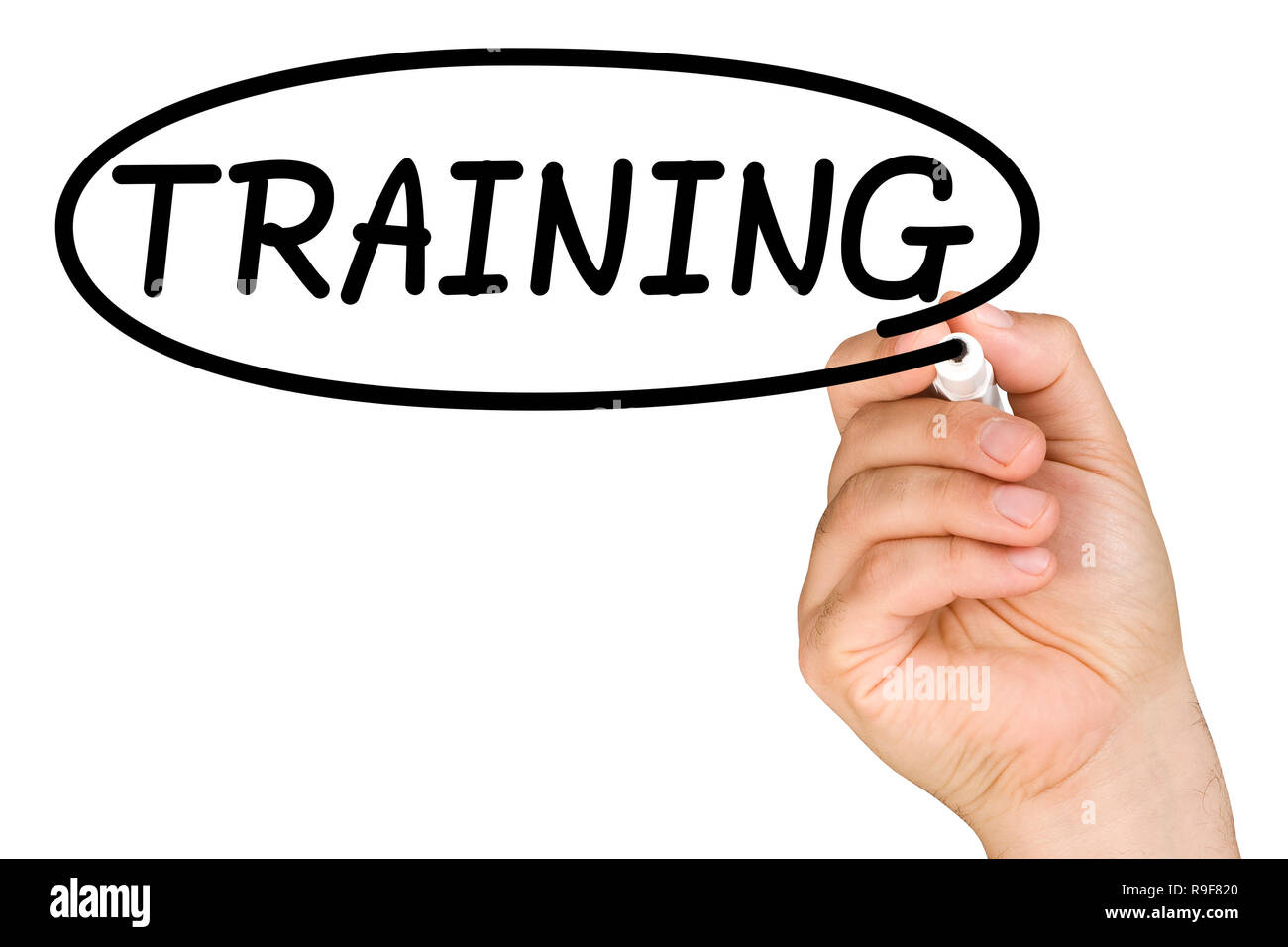 Hand highlighting training word on clear glass whiteboard isolated ...
