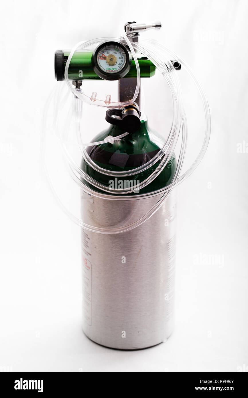 Oxygen cylinder with regulator and cannula attached Stock Photo - Alamy