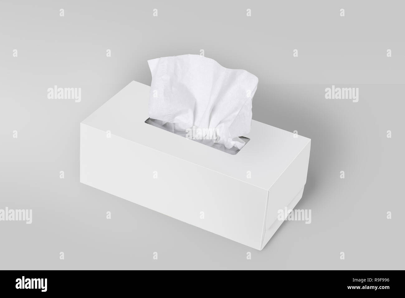 White blank tissue box on gray background with facial tissue, for print ...