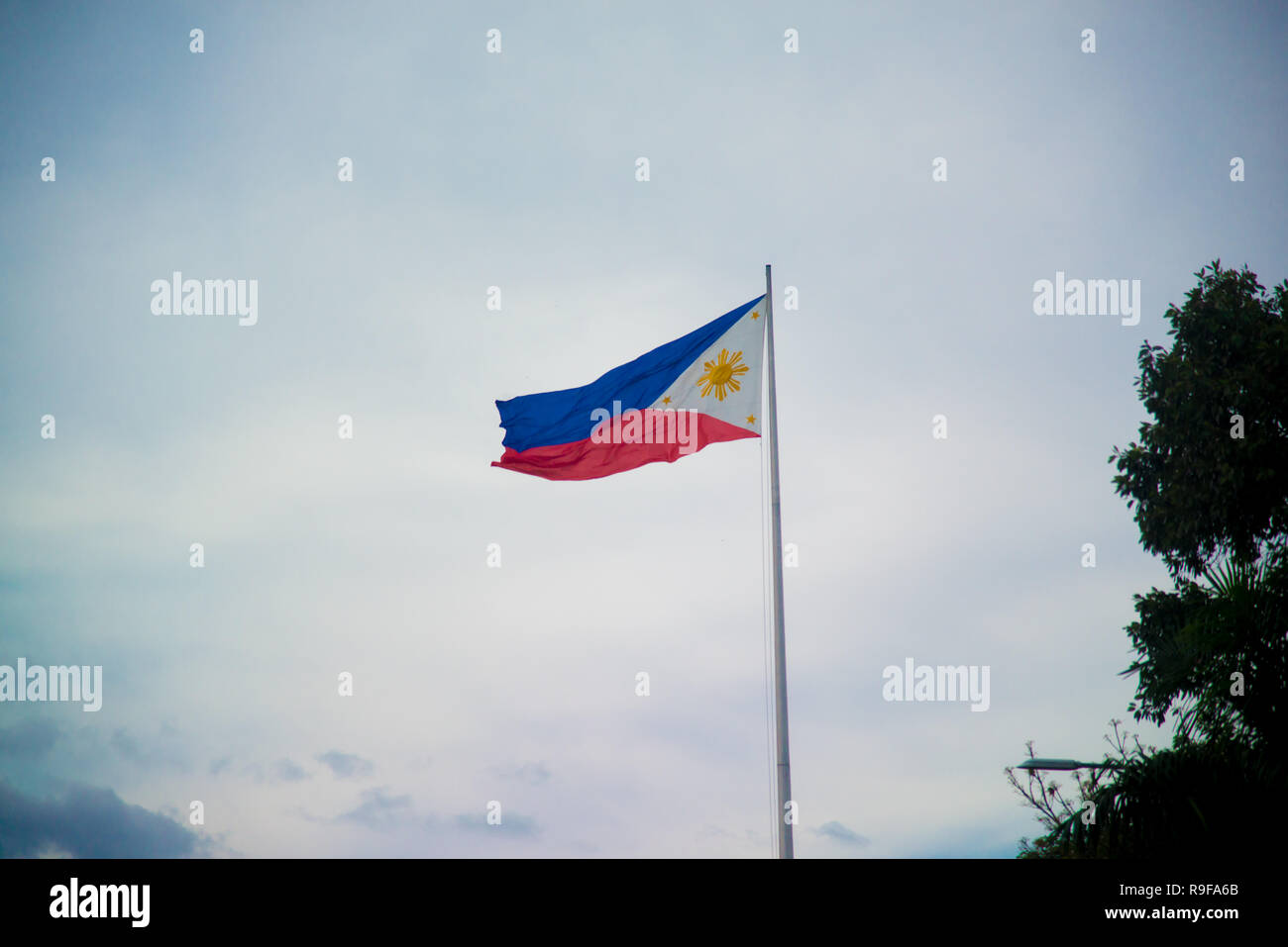 A flag of Philippines. Philippines is a country located in the south ...