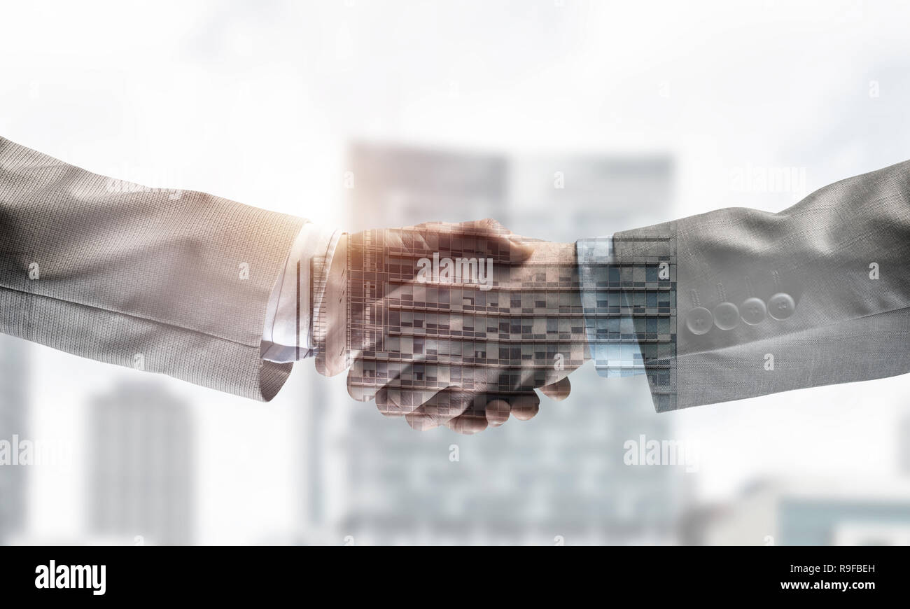 Business handshake as idea for unity and cooperation or greeting Stock ...