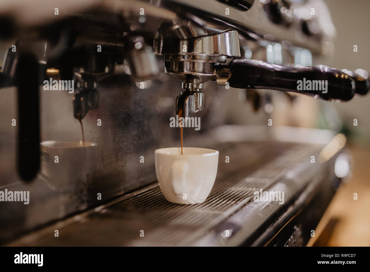 Coffee espresso. Espresso machine making coffee, golden espresso ...