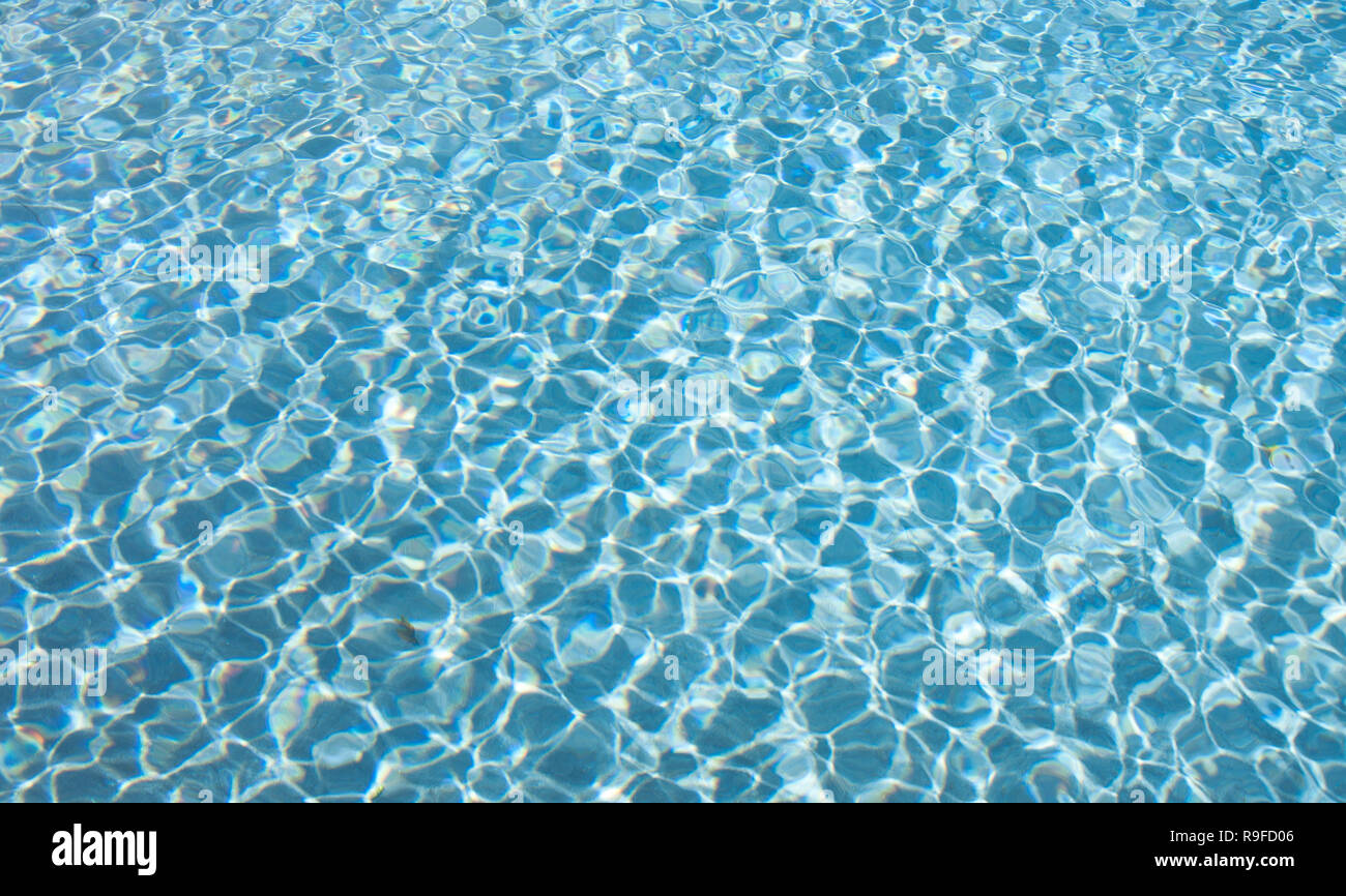Lush swimming pool water Stock Photo - Alamy