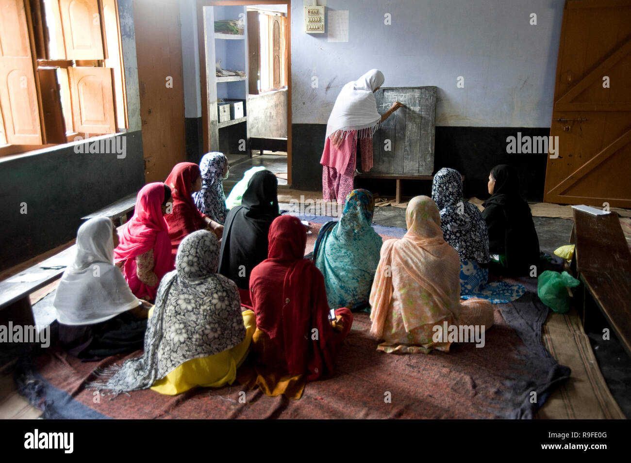 Varanasi / India 20 September 2011 Muslim teacher with children in ...