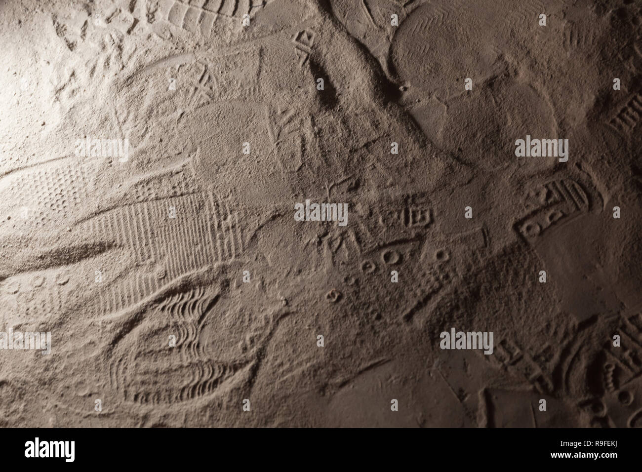 Footprints in dark gray dusty ground, background photo texture Stock ...