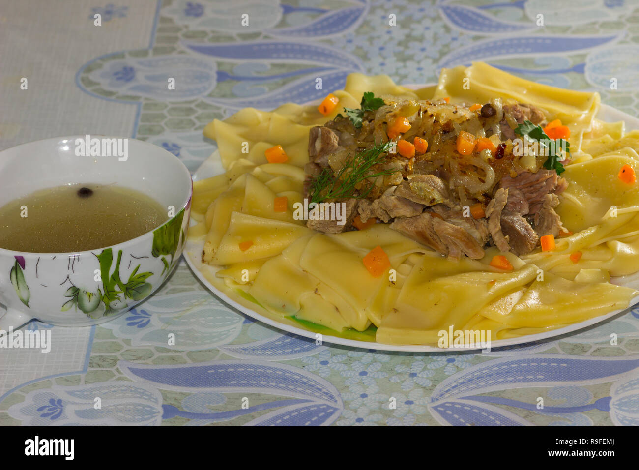 Beshbarmak - a traditional dish in Central Asia Stock Photo - Alamy