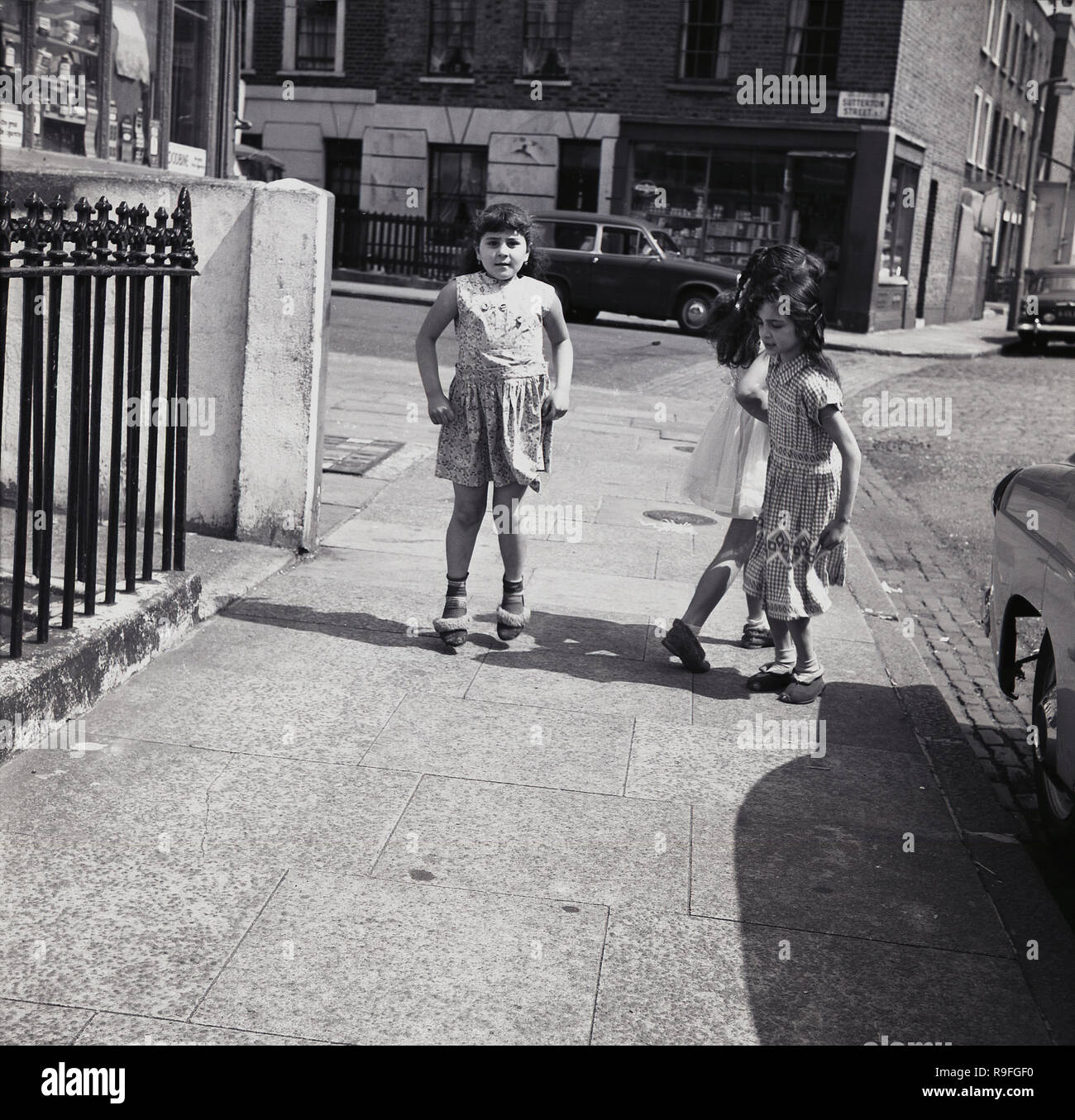 Children playing in street 1960s hi-res stock photography and images ...