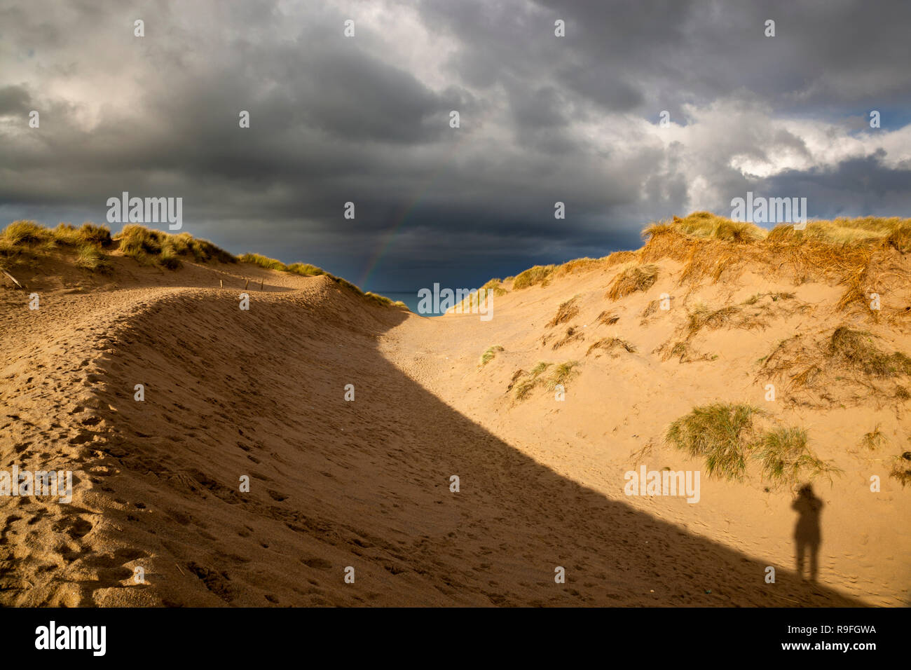 Holywell; Sand Dunes with Photographers shadow; Cornwall Stock Photo ...
