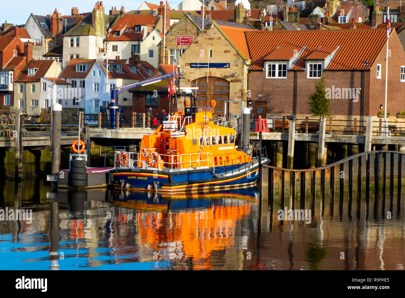 Whitby lifeboat moored at the RNLI station in the Harbour Stock Photo ...
