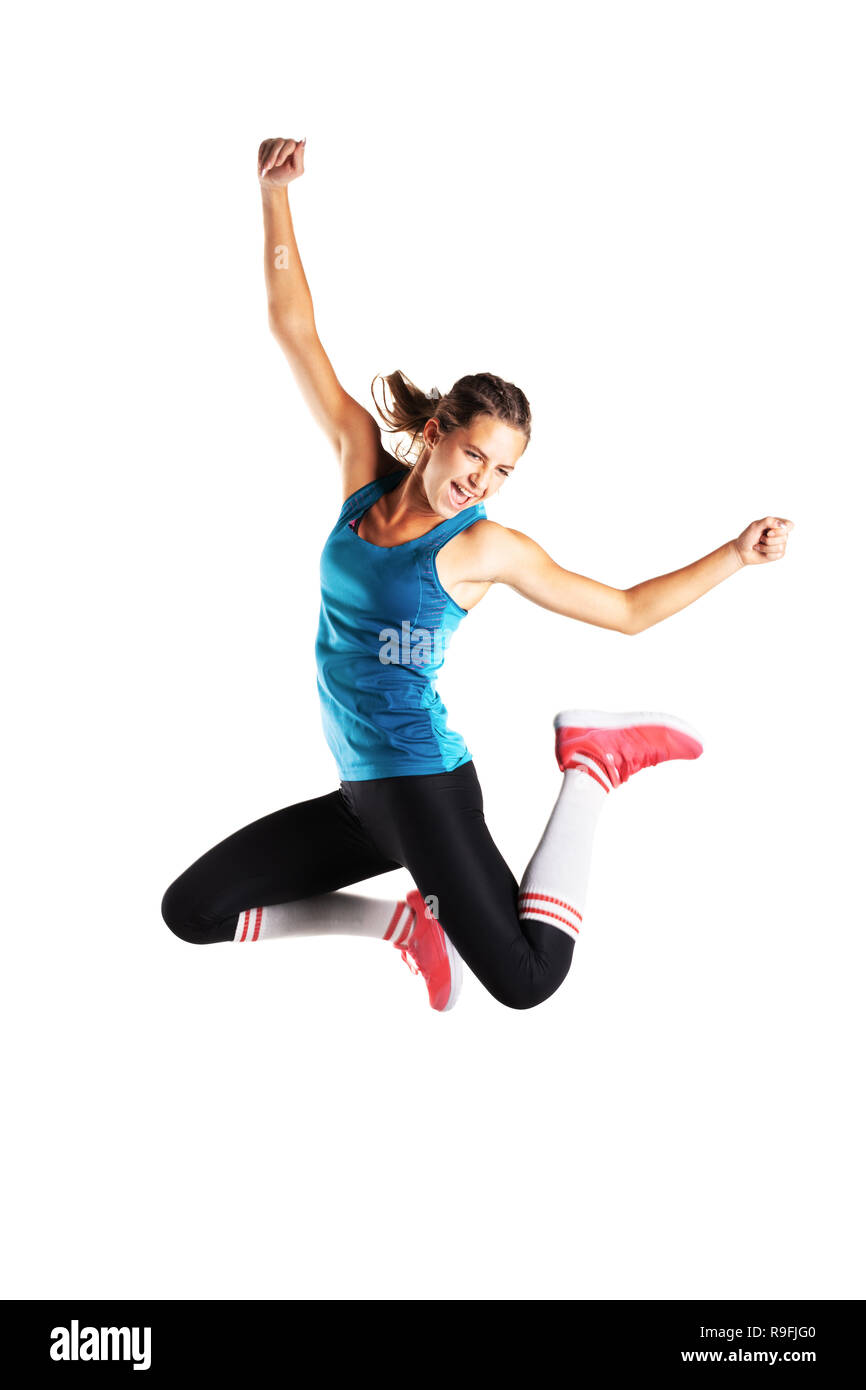 fit runner girl jumping with happy expression against white background ...