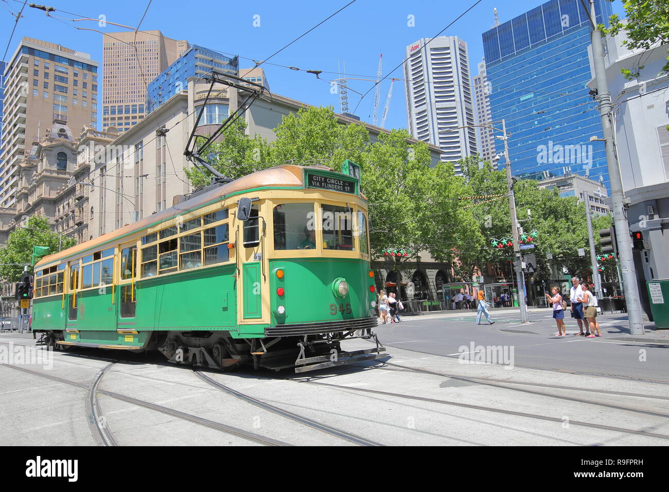 Tram run through downtown Melbourne Australia Stock Photo - Alamy
