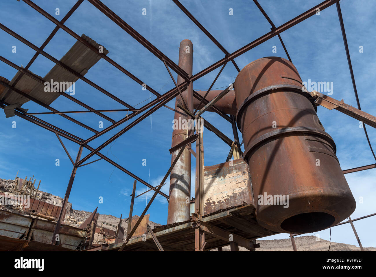 A rusty tank suspended opn scaffolding in an abandoned lead mine near ...