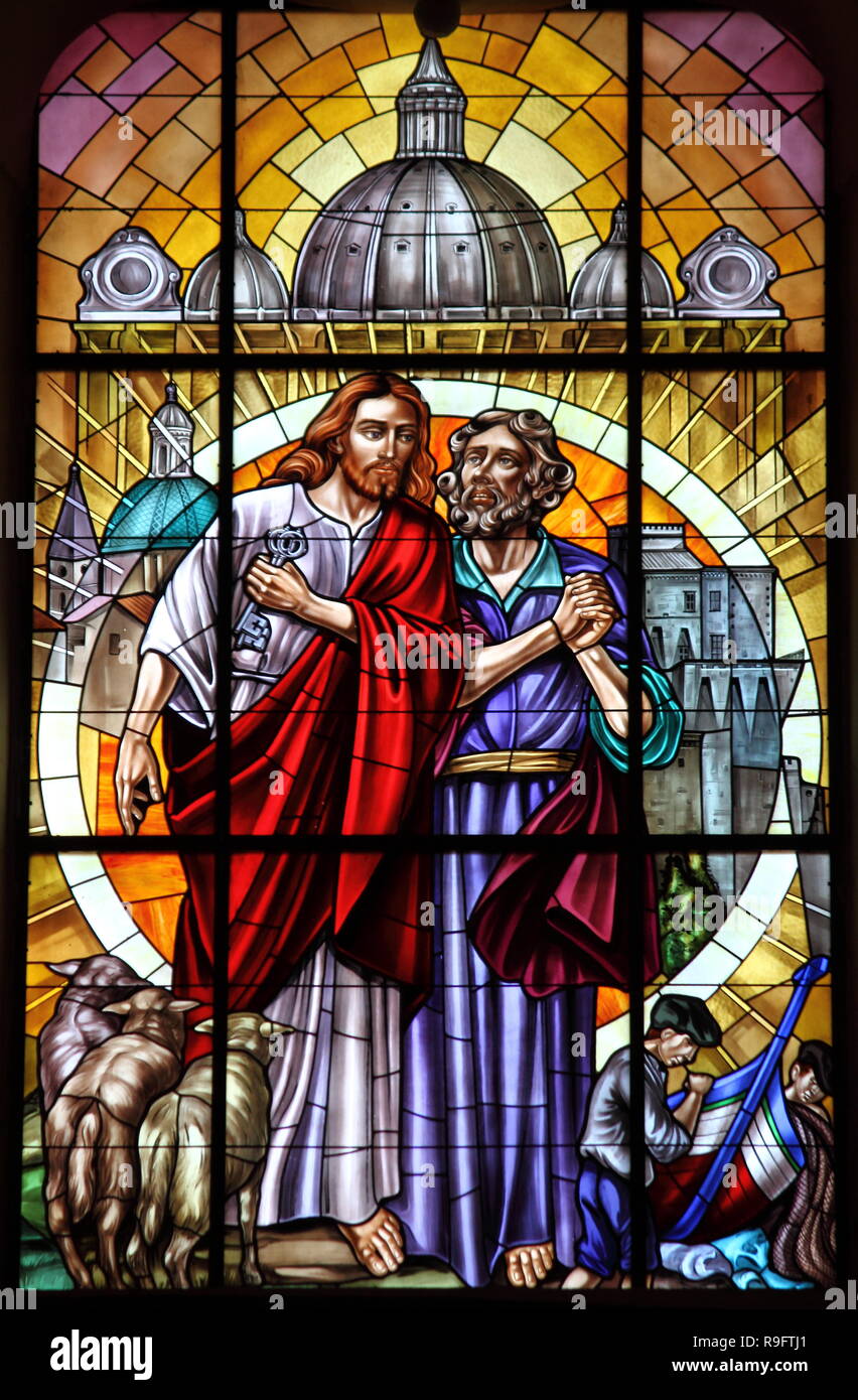 Stained glass window with Saint Peter and Jesus Stock Photo - Alamy