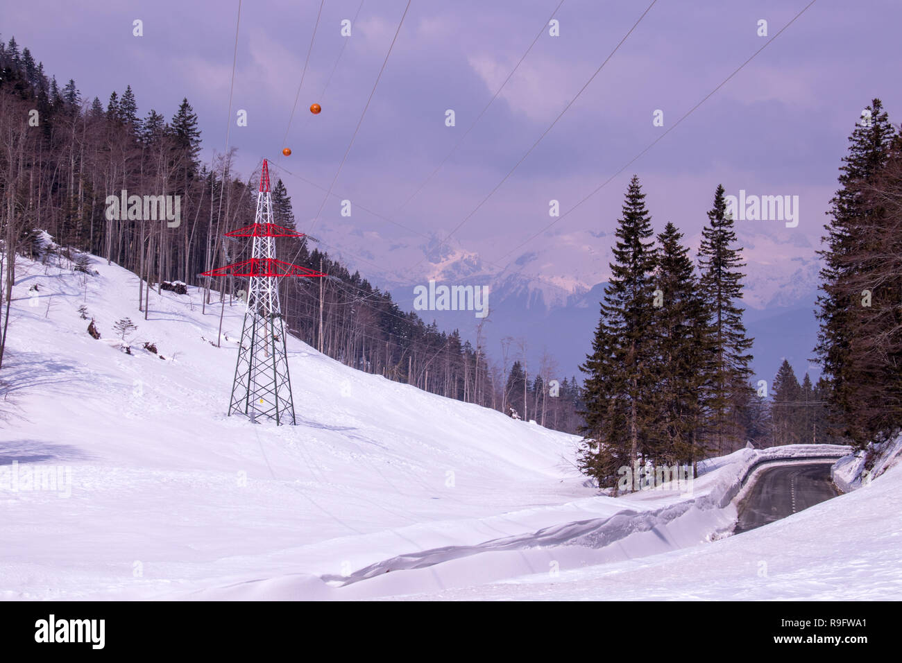 big red electric tower and road Stock Photo - Alamy