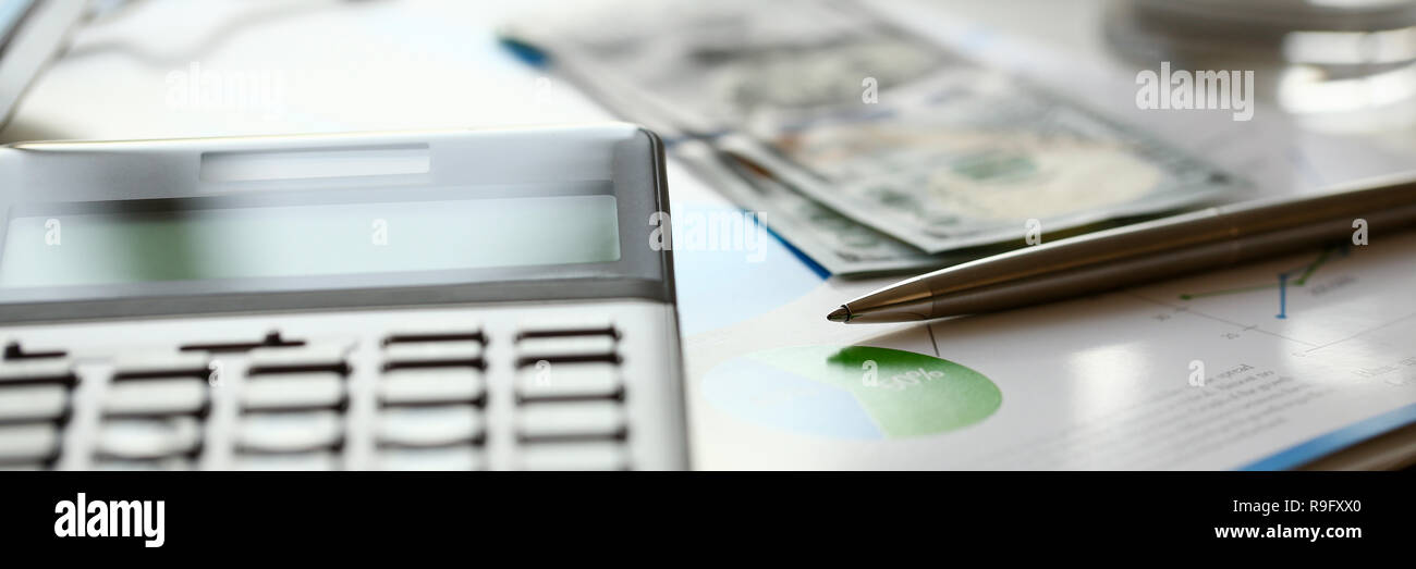 Silver calculator with gray keyboard is lying Stock Photo - Alamy