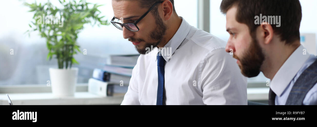 Group of people in office use laptop pc portrait Stock Photo - Alamy