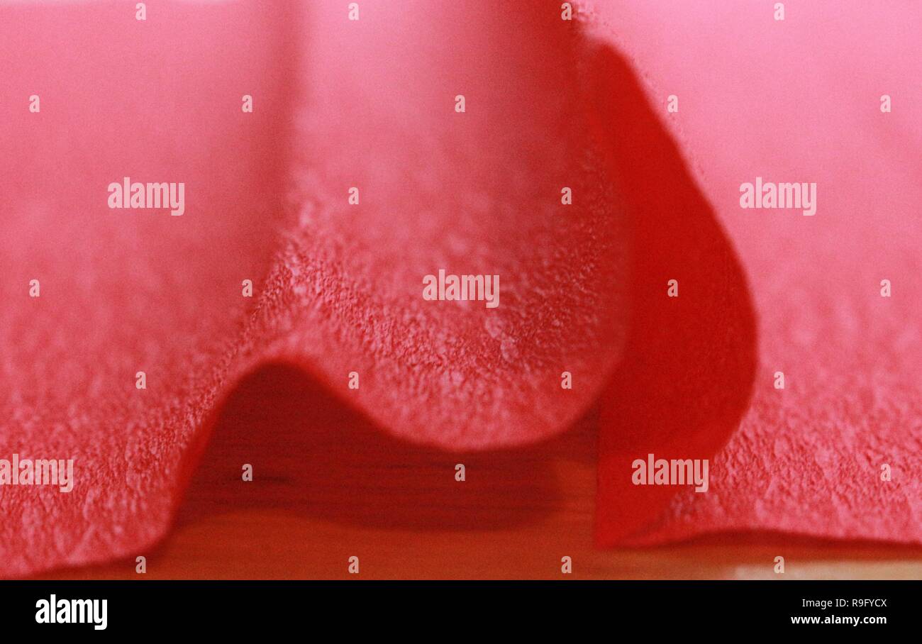 Red creased paper hi-res stock photography and images - Alamy