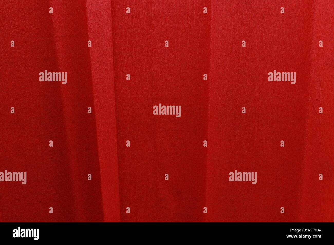 Red crepe paper background landscape format Stock Photo - Alamy