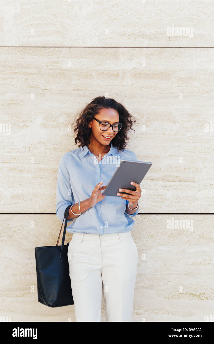 Woman reading tablet in hi-res stock photography and images - Alamy