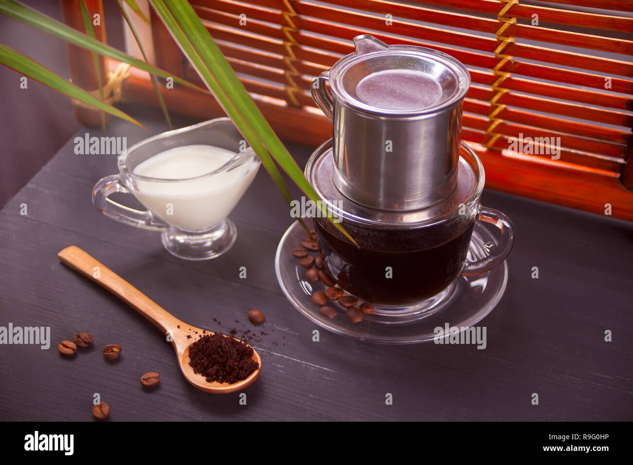 Traditional Vietnamese coffee on rustic background in oriental style ...