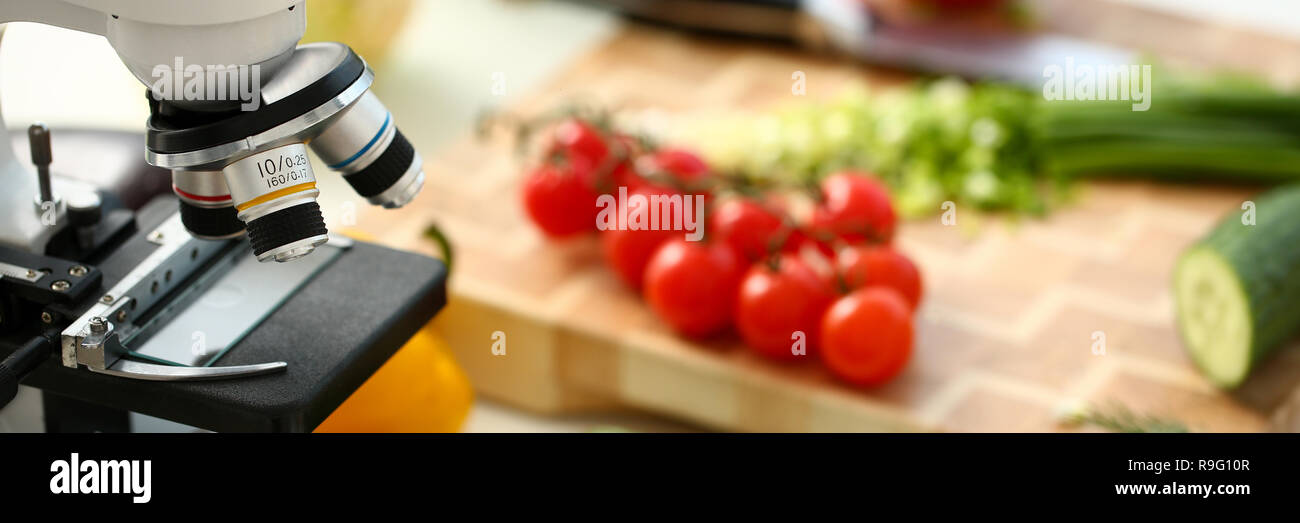 Microscope head on kitchen background Stock Photo - Alamy