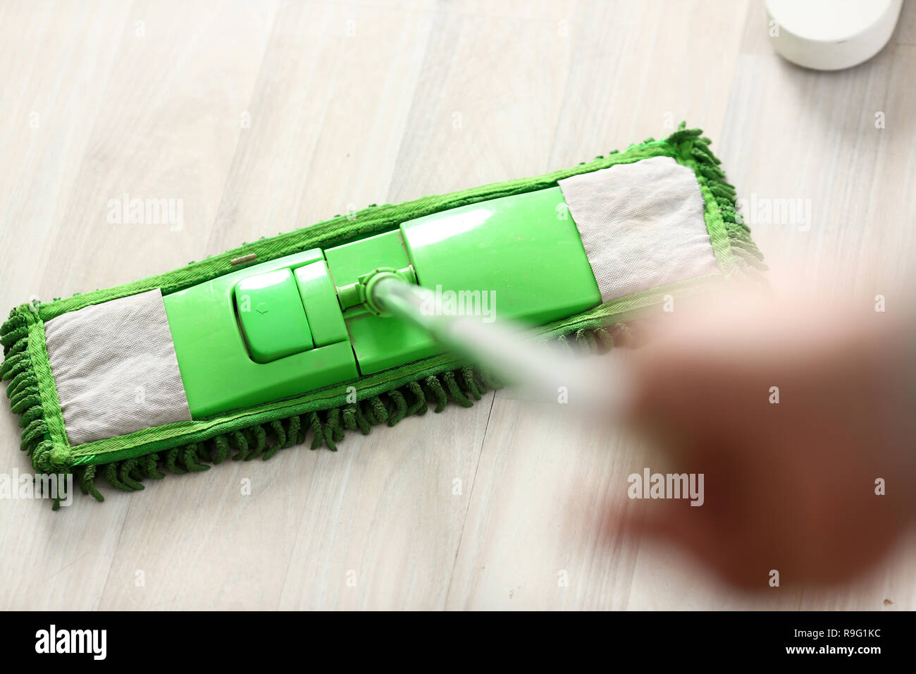Green plastic mop Stock Photo - Alamy