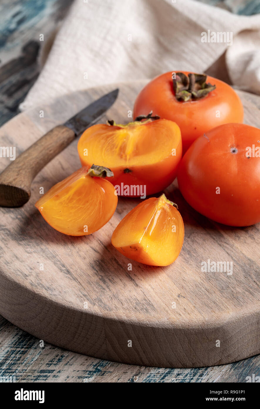 Fresh persimmon fruits Stock Photo - Alamy