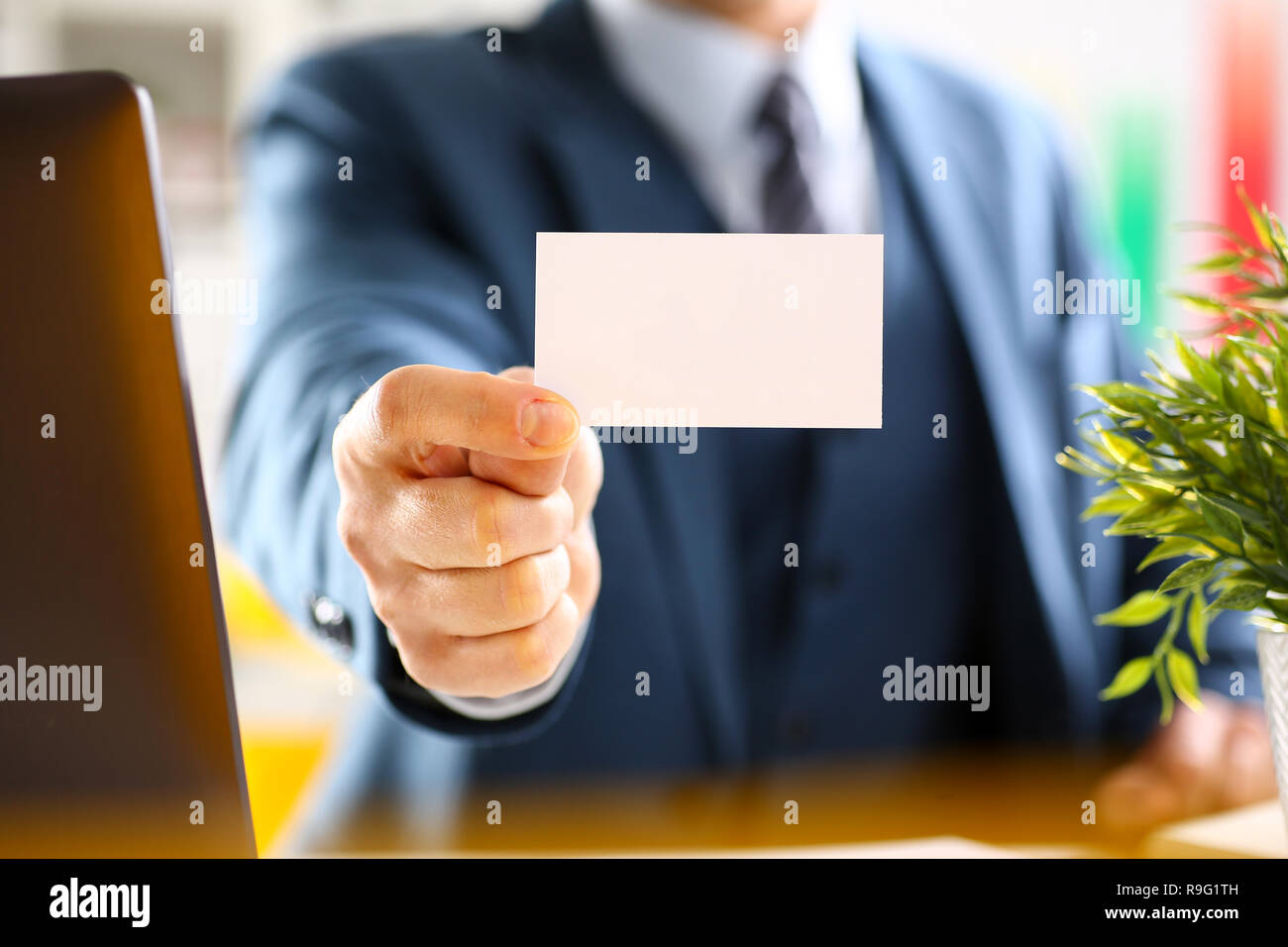 Male arm in suit give blank calling card Stock Photo - Alamy