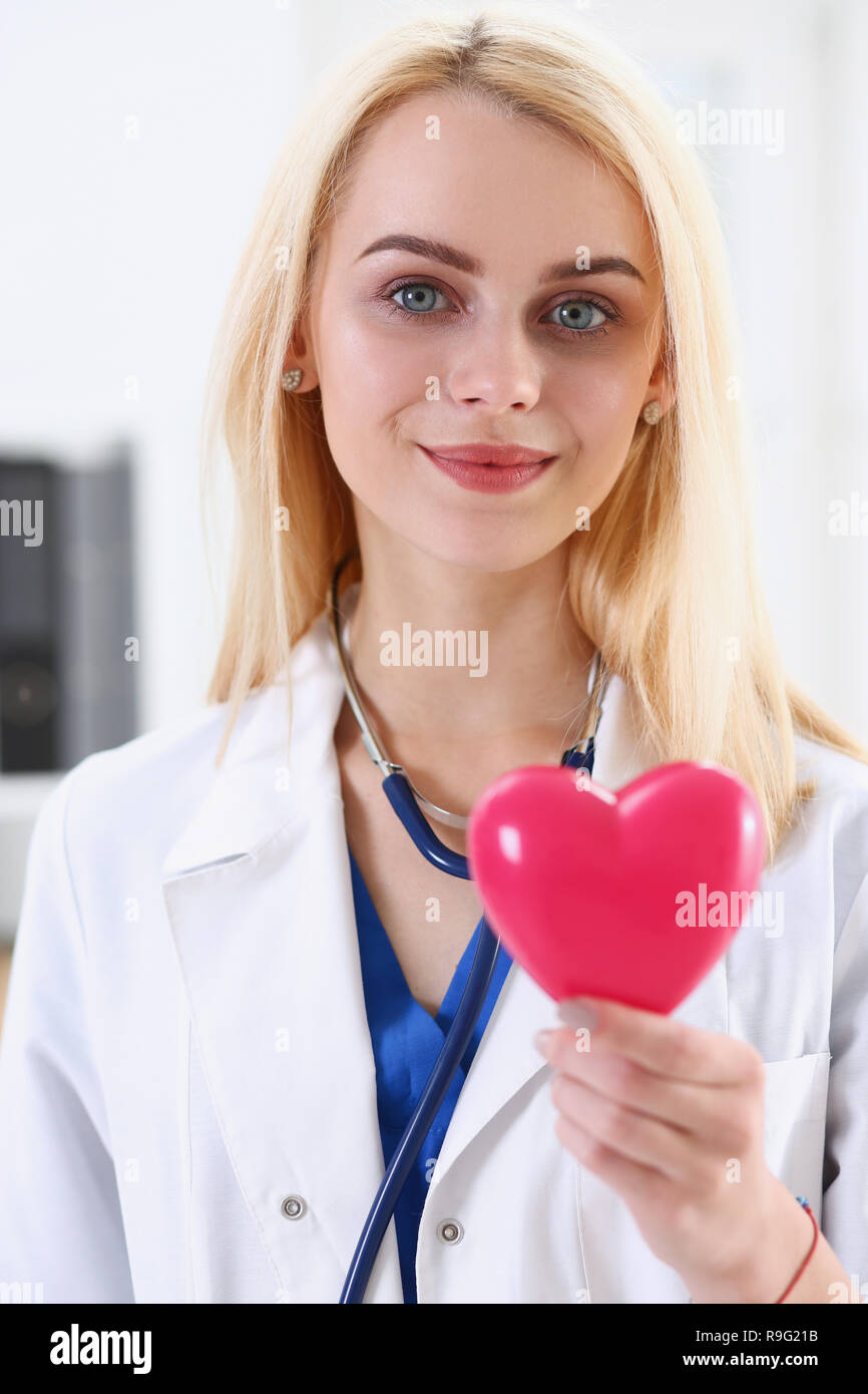 Female medicine doctor hands holding and covering Stock Photo - Alamy