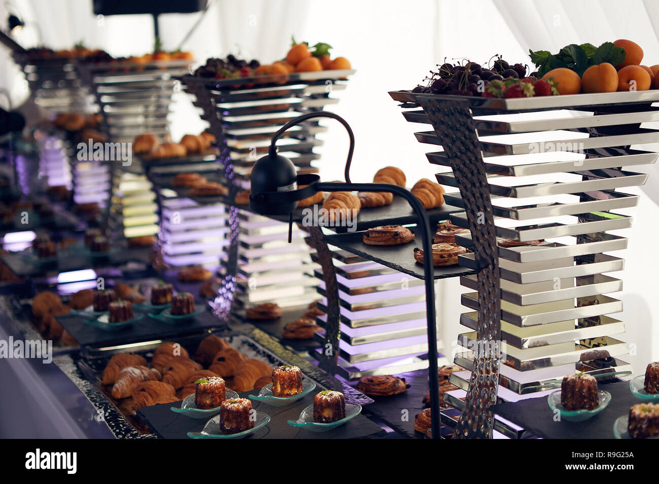 catering services background with snacks on guests table in restaurant ...