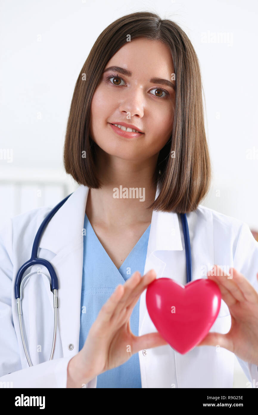Female medicine doctor hands holding and covering Stock Photo - Alamy