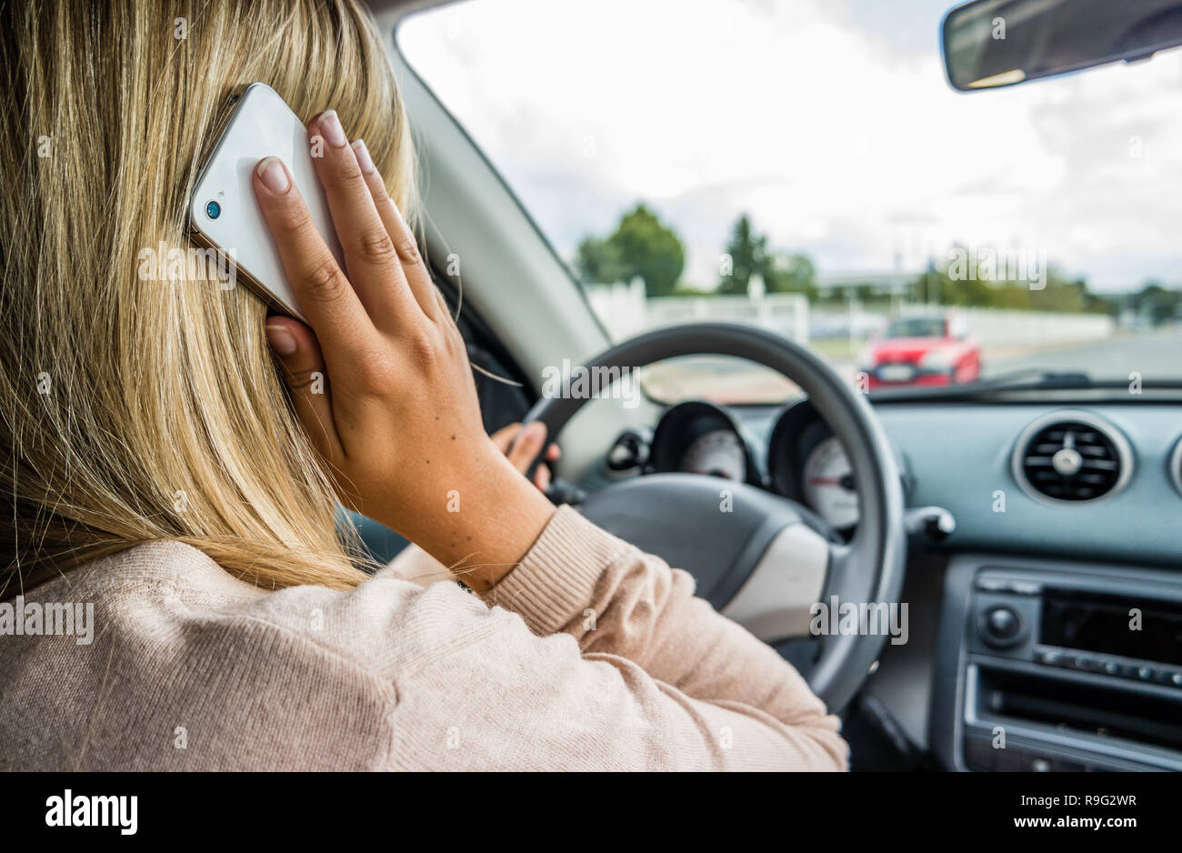 Mobile phone risk in traffic Stock Photo - Alamy