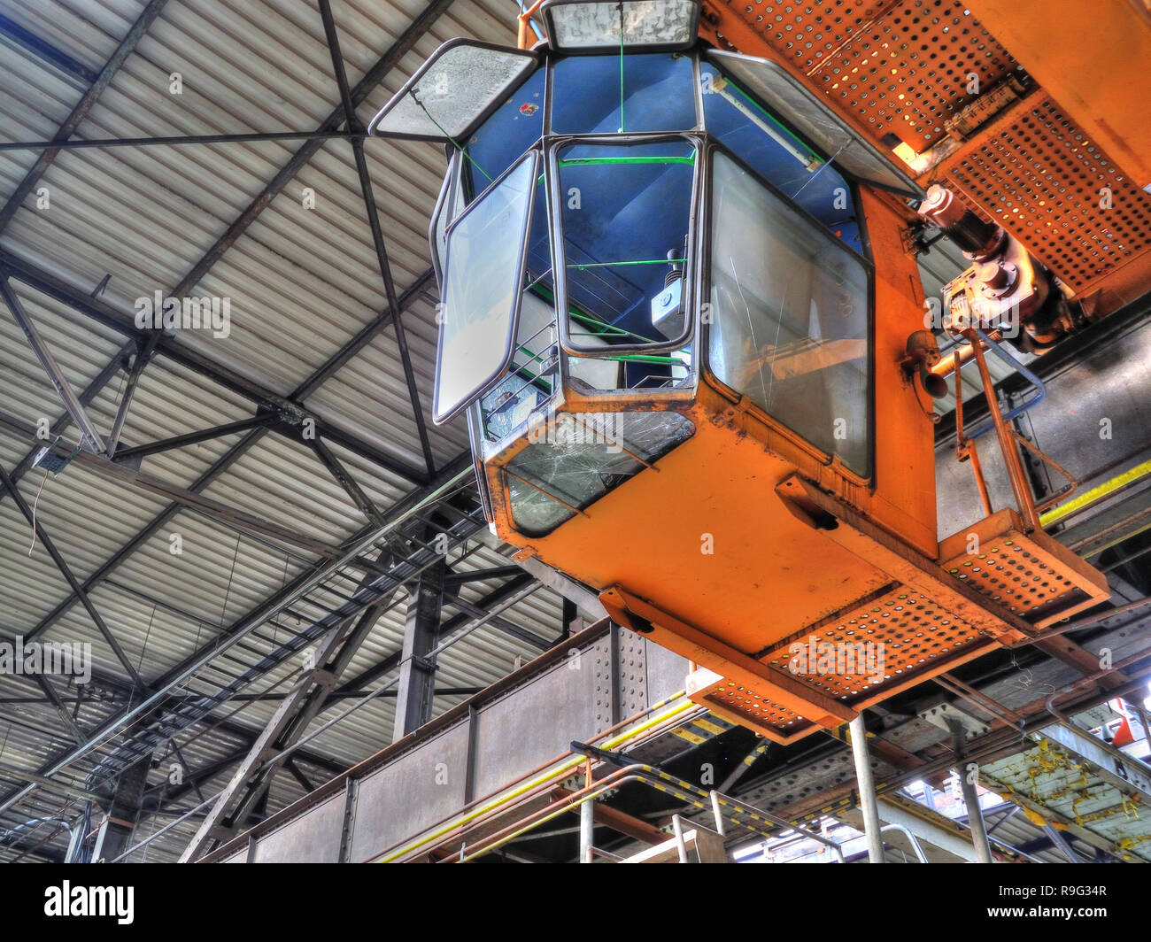 Indoor crane Ceiling crane Driver's cab Stock Photo - Alamy