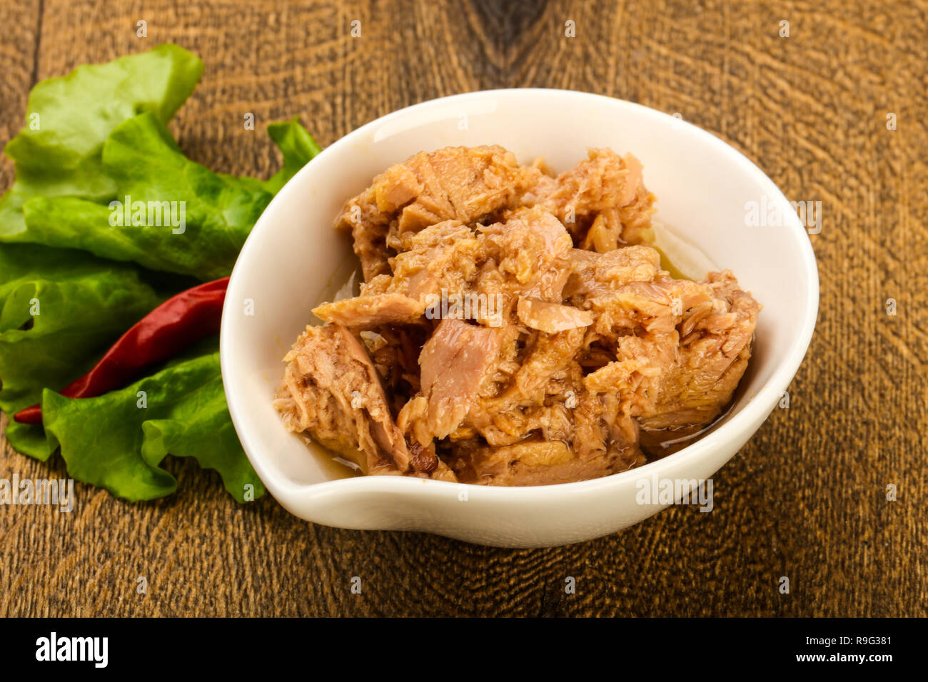 Canned tuna fish in the bowl ready for cooking Stock Photo - Alamy