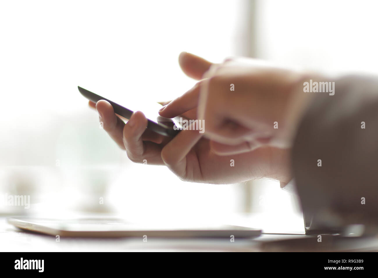 close up.businessman tapping the screen of the smartphone Stock Photo ...