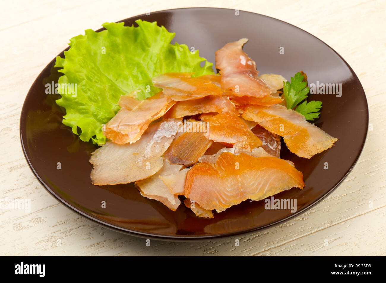 Smoked catfish fillet carpaccio Stock Photo - Alamy