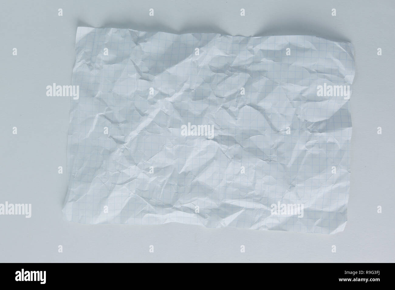 crumpled notebook sheet on white background.photo with copy space Stock ...