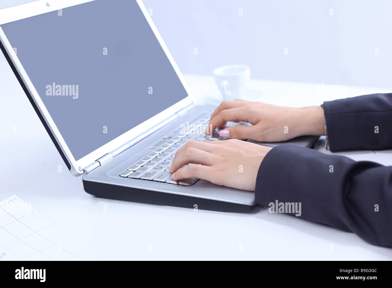 boss with a clipboard , sitting in an office. photo with copy space ...