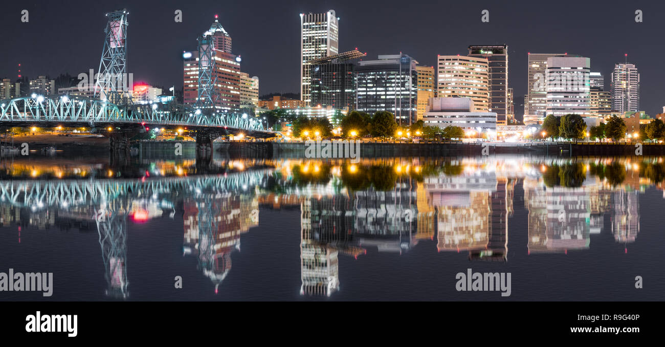 Portland, Oregon Night Skyline reflection along the Willamette River ...