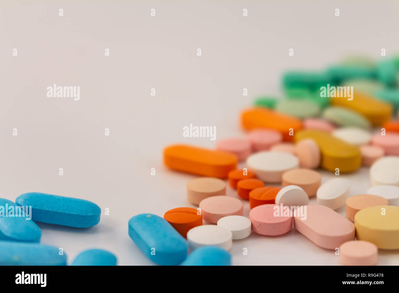 Drugs in the form of medicines. Capsules and tablets of various colors ...