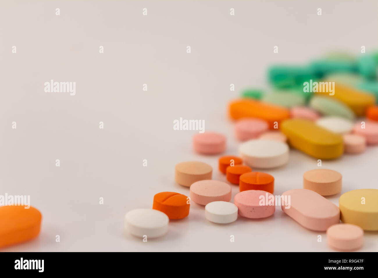 Drugs in the form of medicines. Capsules and tablets of various colors ...