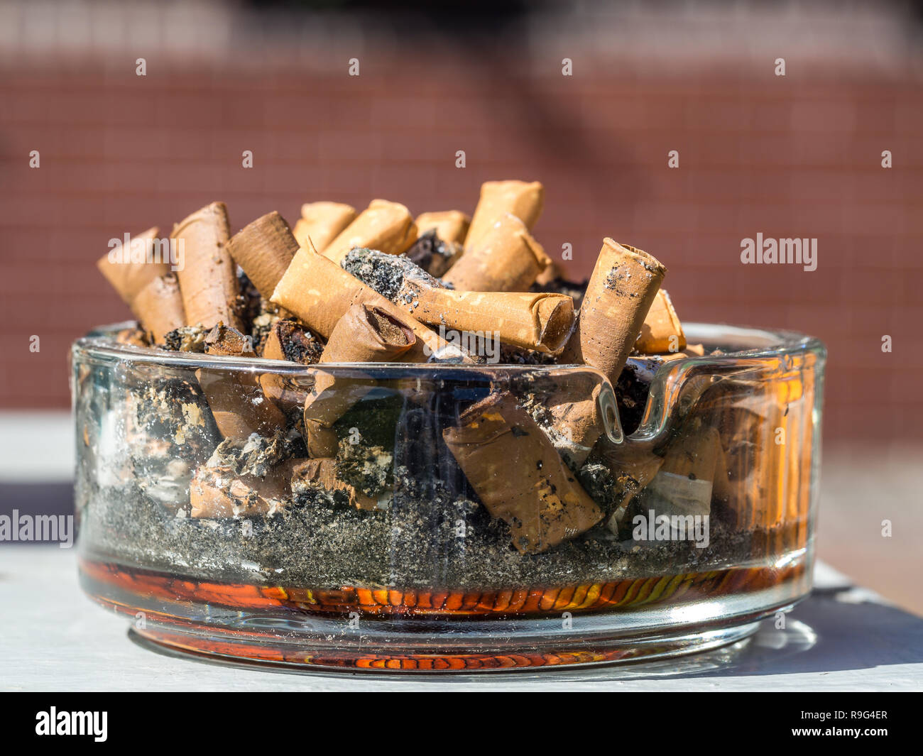 Ashtray symbolic picture Stock Photo - Alamy