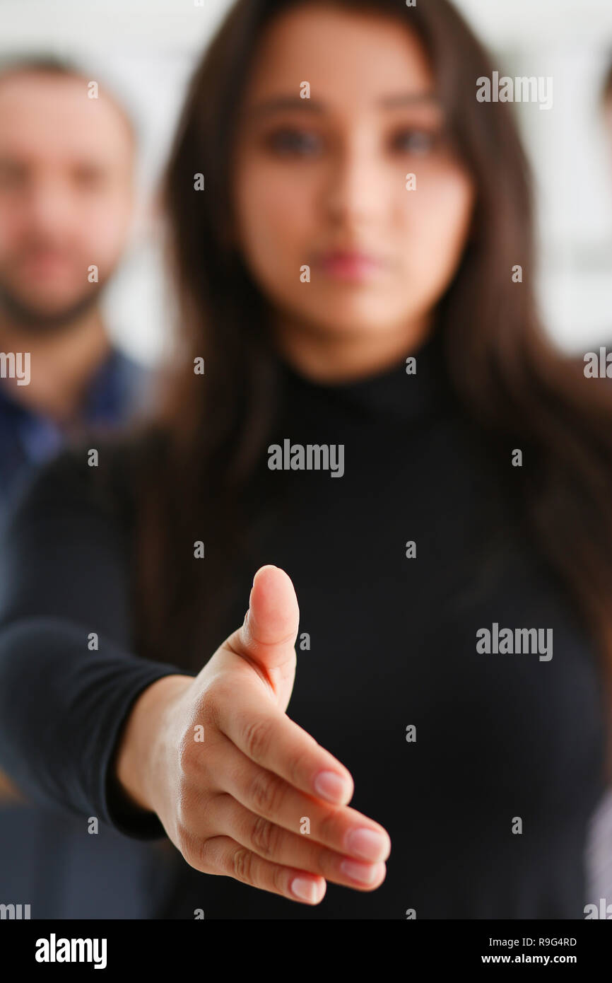 Businesswoman offer hand to shake as Stock Photo - Alamy