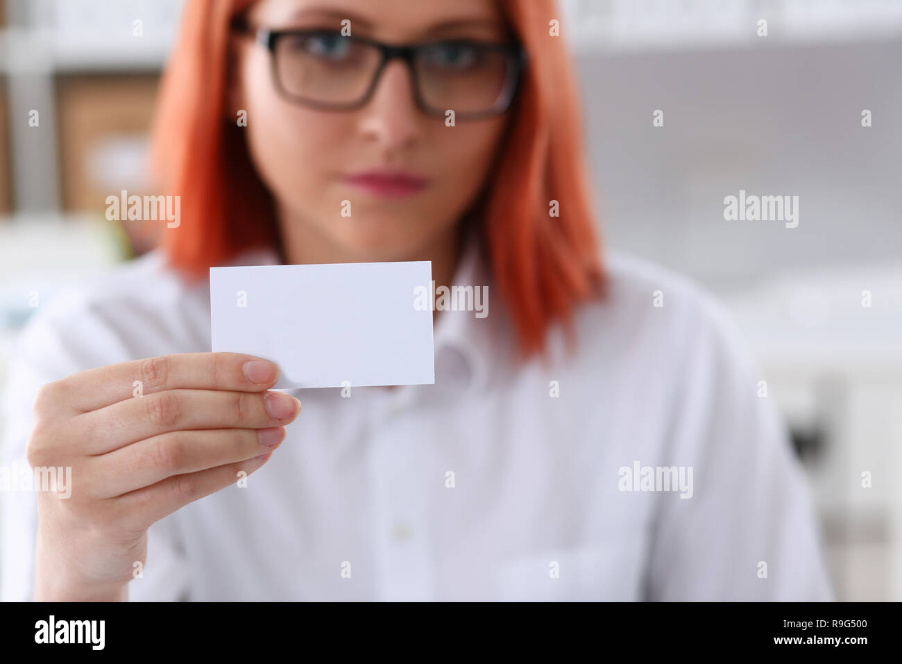 Female hand in suit give blank calling card Stock Photo - Alamy